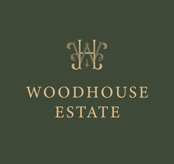 A heritage brand and family crest for Woodhouse Estate